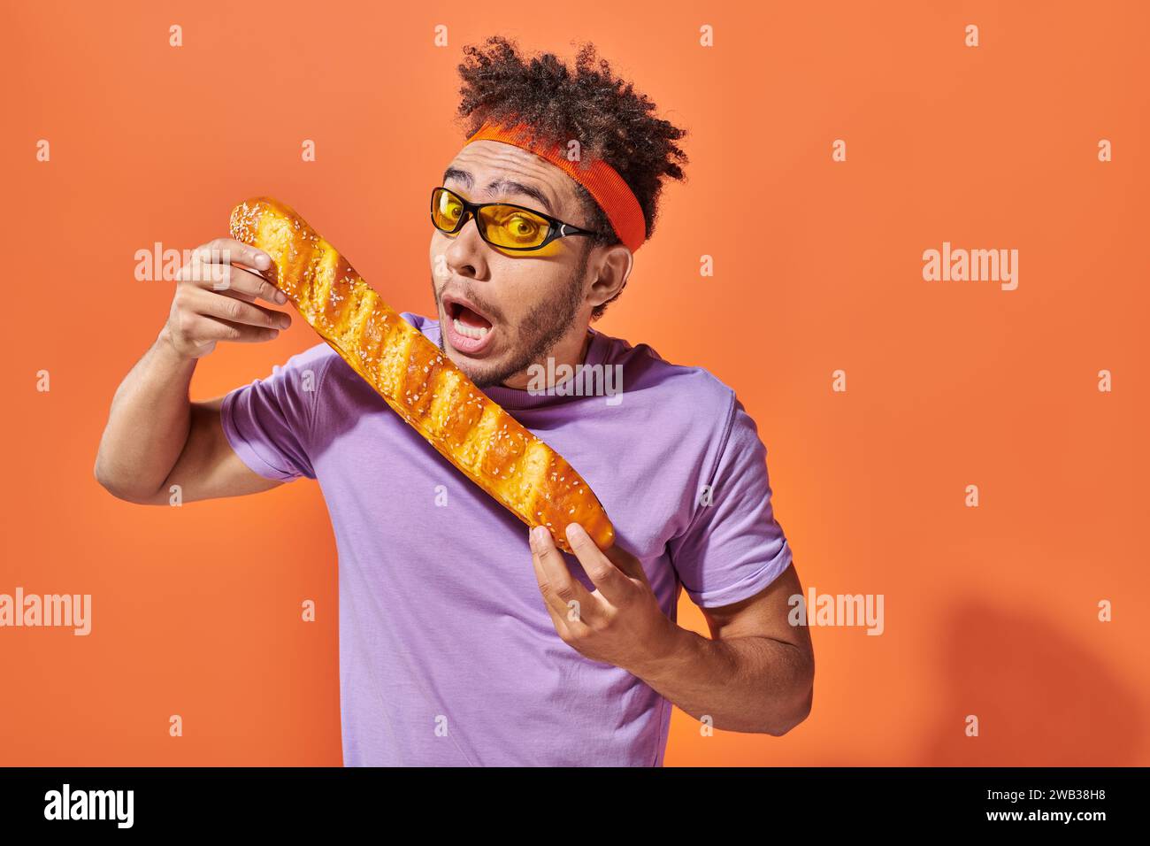 Man biting sandwich hi-res stock photography and images - Alamy