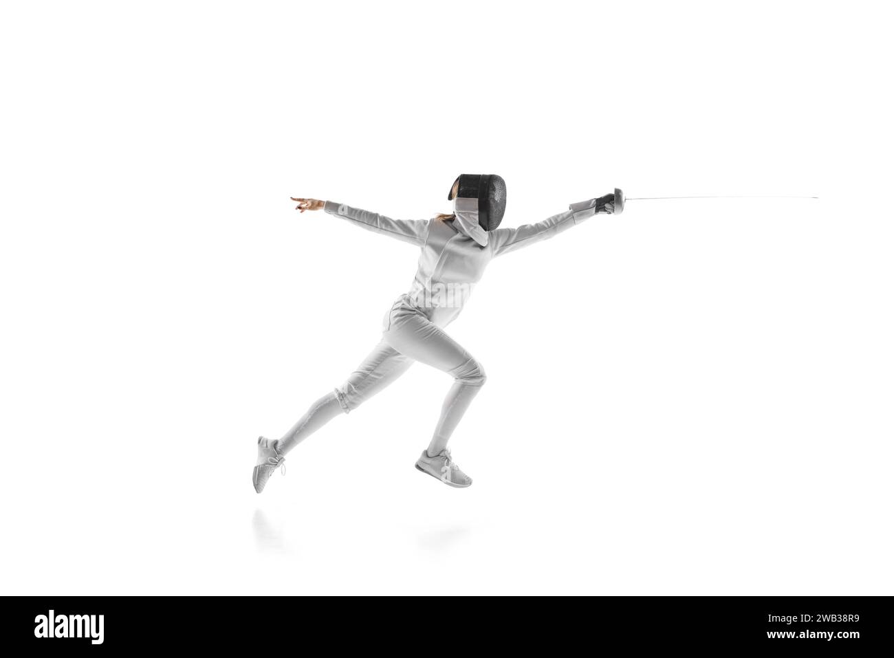 Dynamic portrait of fierce sportswoman while lightning-fast fencing ...