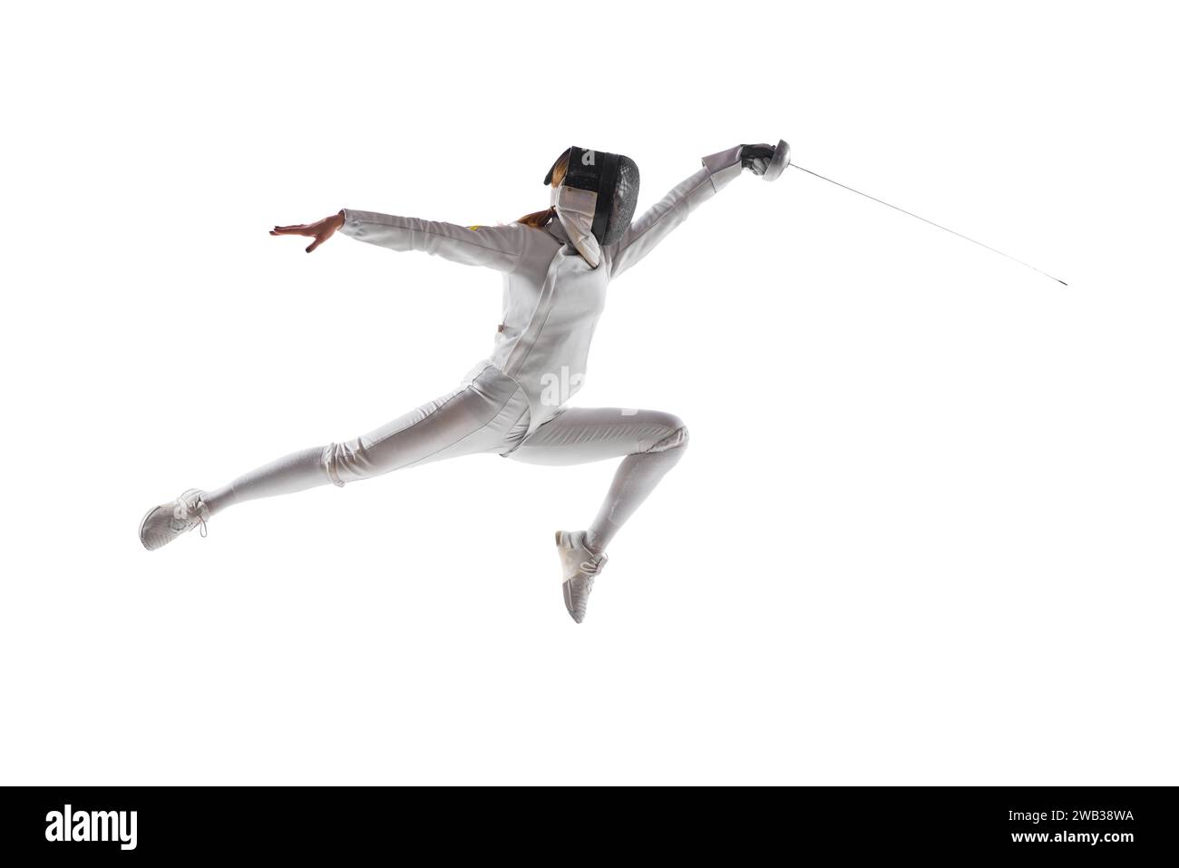 Artistry of combat. Female fencer gracefully executes complex fencing ...