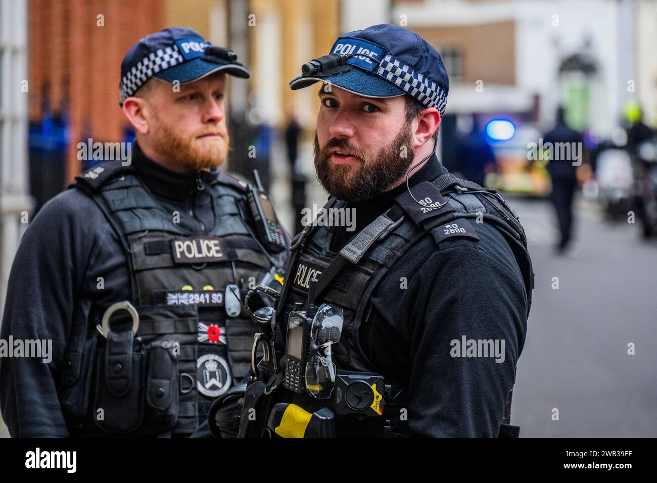 London, UK. 8th Jan, 2024. Police (including armed units from the ...