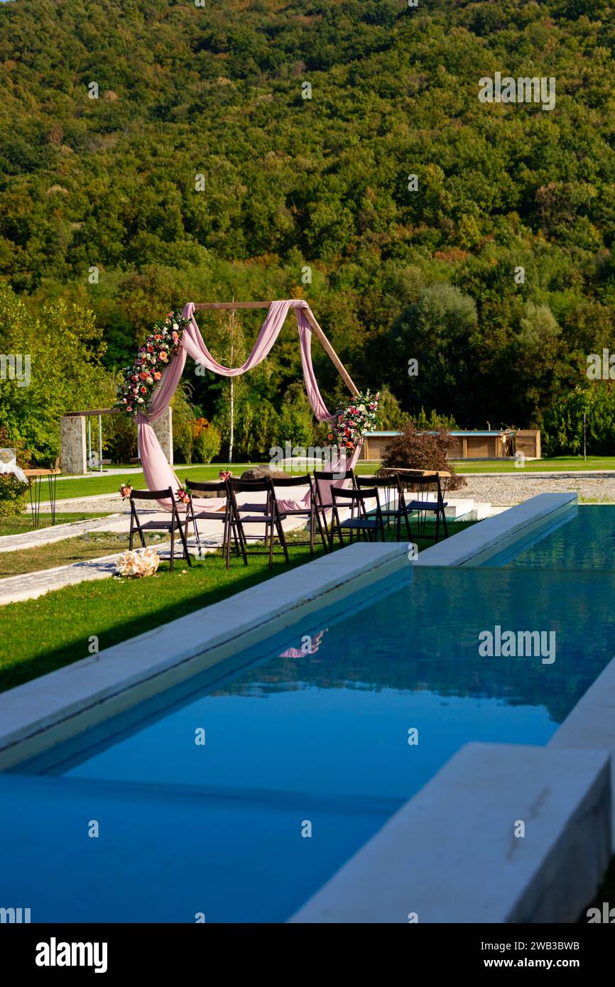 Wedding arch decoration. Elegant ceremony in Bulgarian beautiful nature ...
