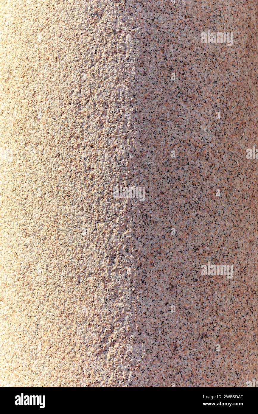 Smooth stone column of pink granite close-up background Stock Photo - Alamy