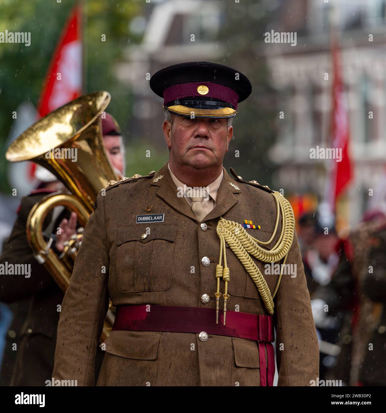 A Caucasian man in a military costume marching at a parade in Leiden ...