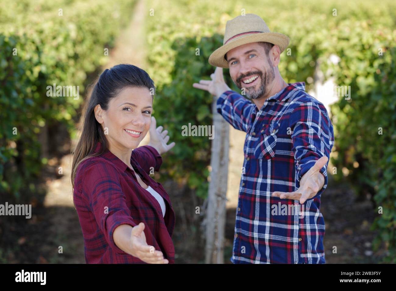 couple with open arms Stock Photo - Alamy