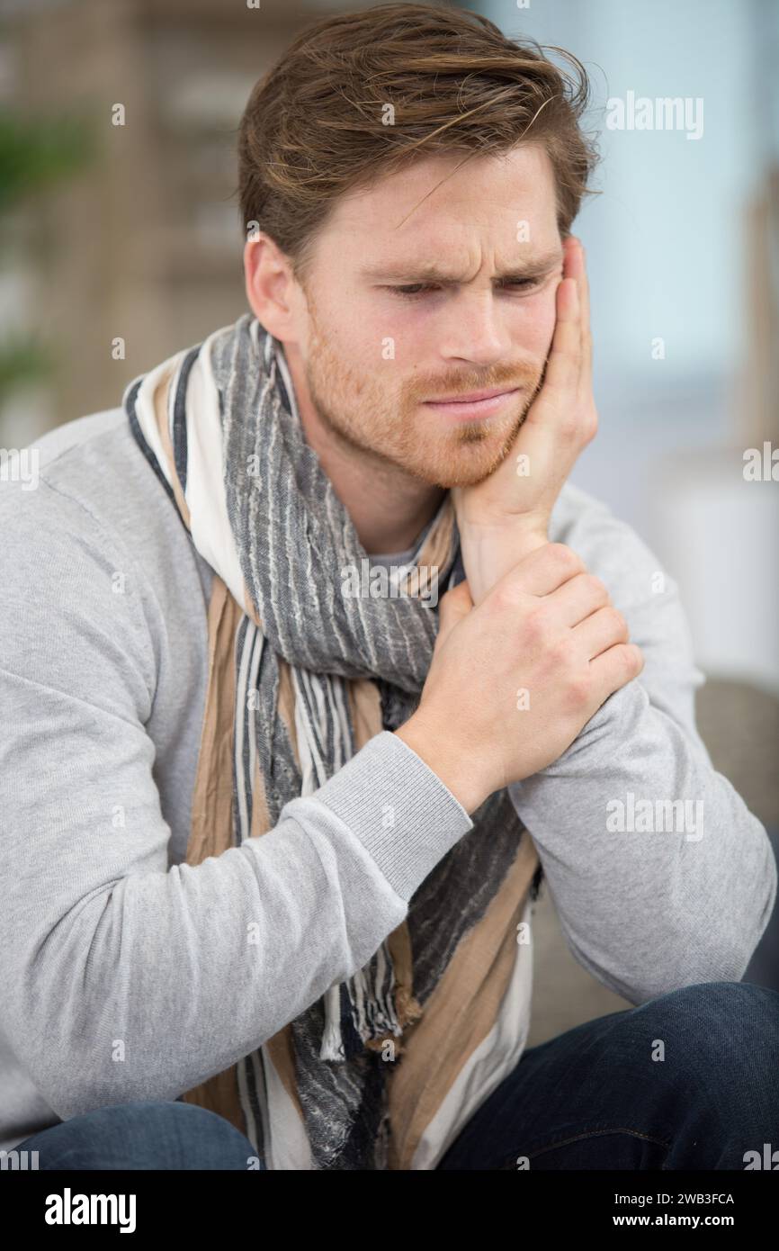 man suffering from teeth ache Stock Photo - Alamy