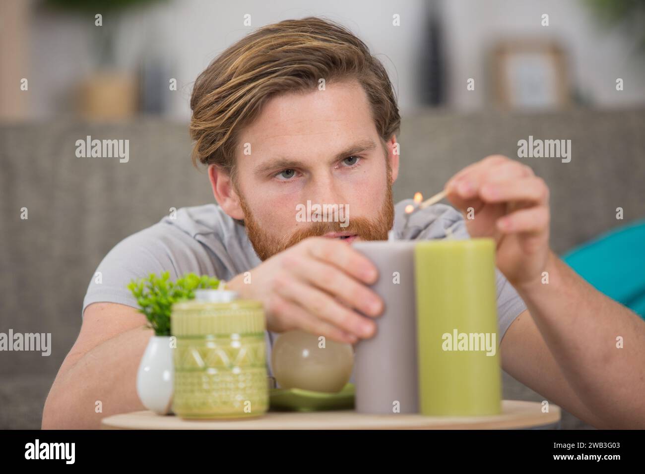 Putting candles hi-res stock photography and images - Alamy