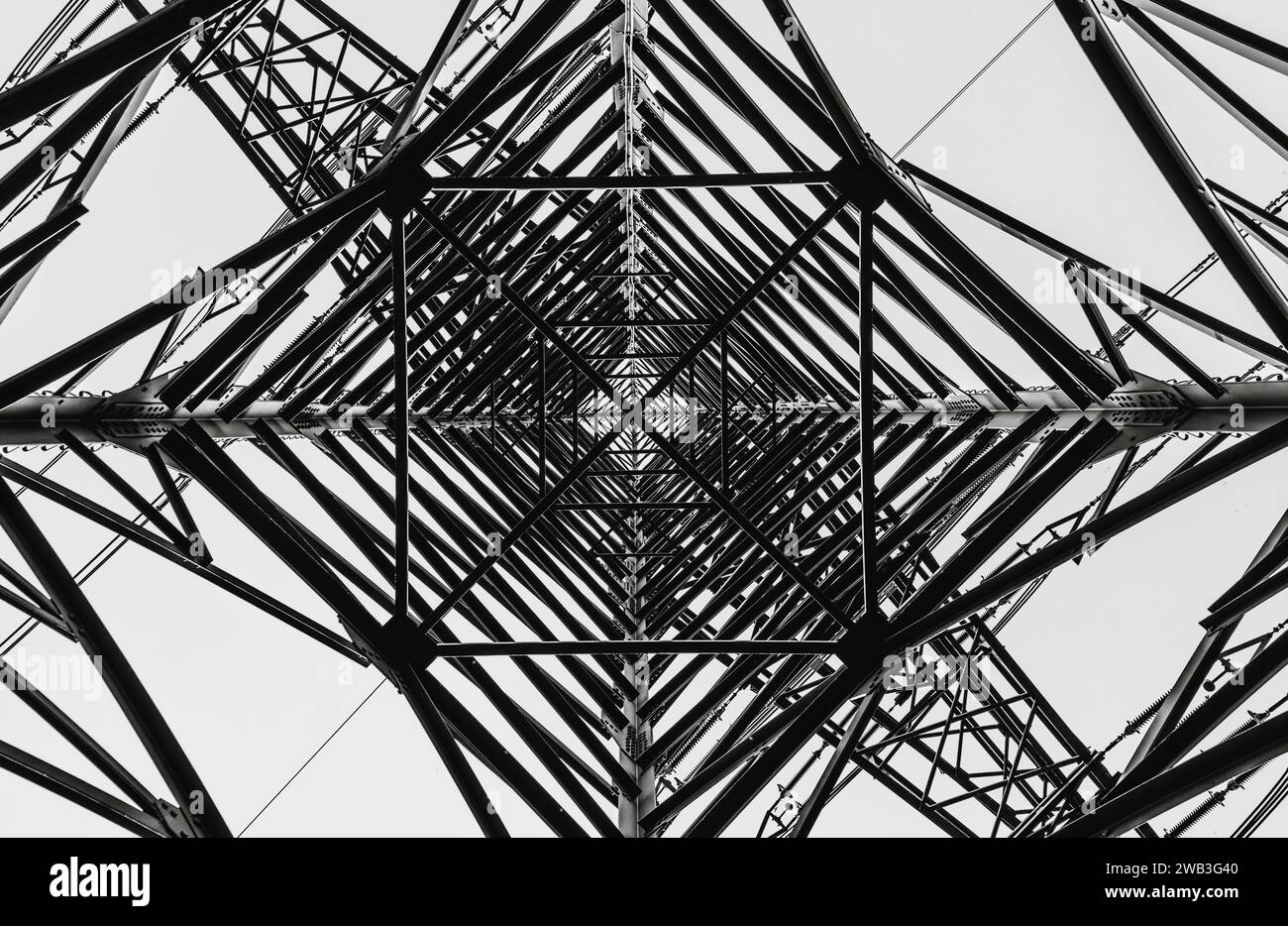 A transmission tower stands a backdrop of a sky Stock Photo - Alamy