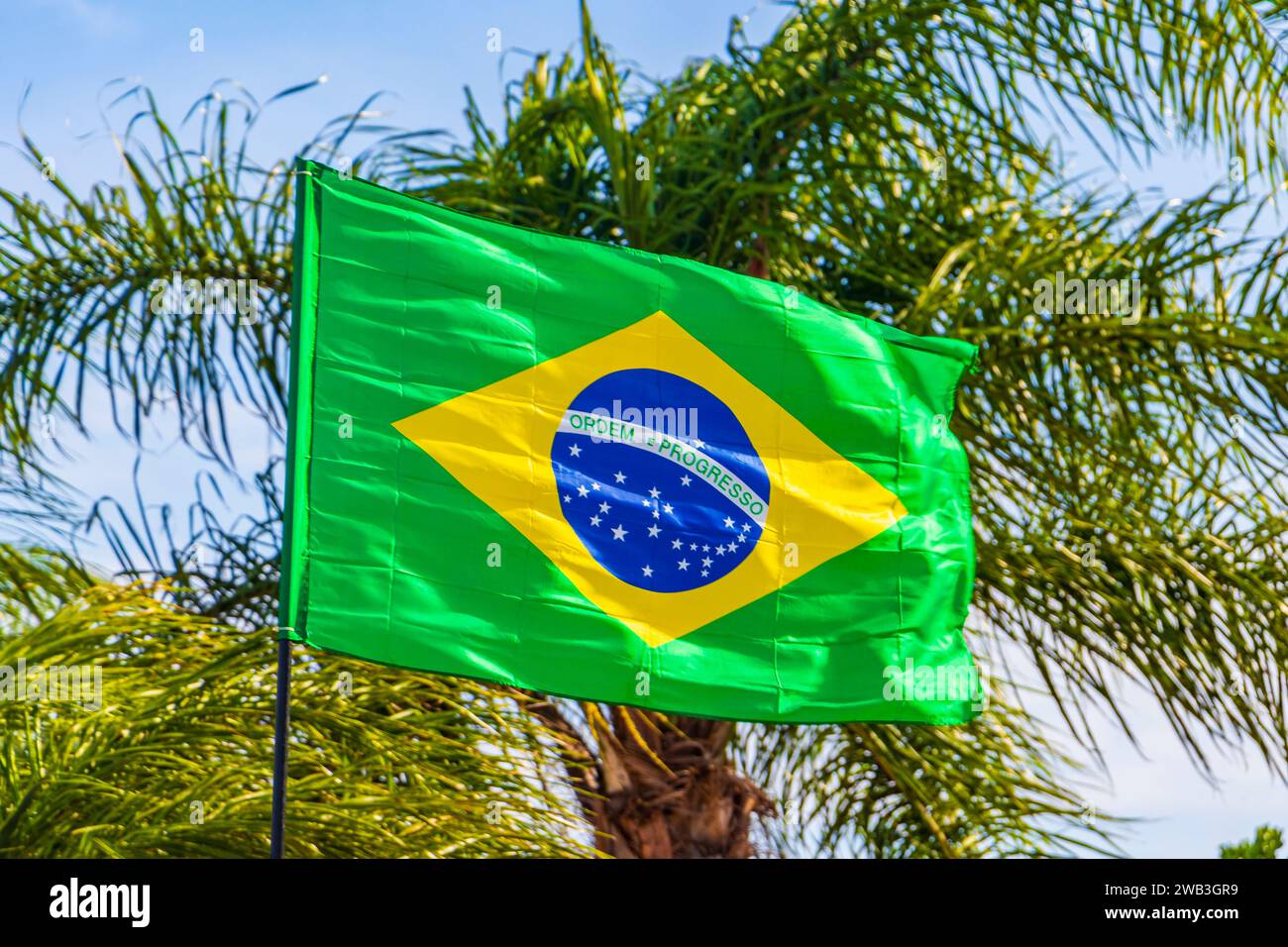 Blue sky background with brazil flag hi-res stock photography and ...