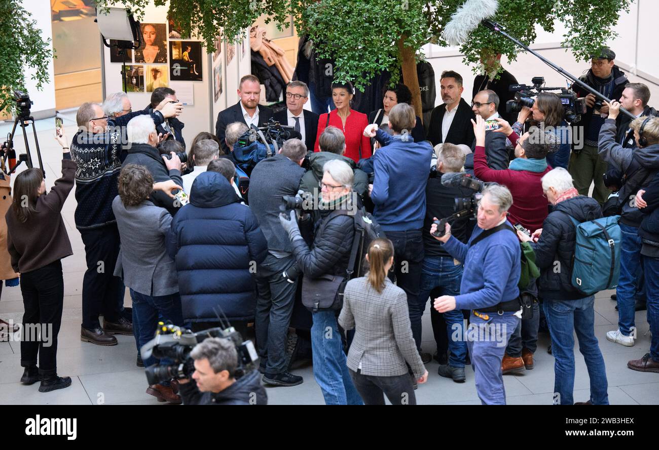 Berlin, Germany. 08th Jan, 2024. Sahra Wagenknecht (M) is surrounded by ...
