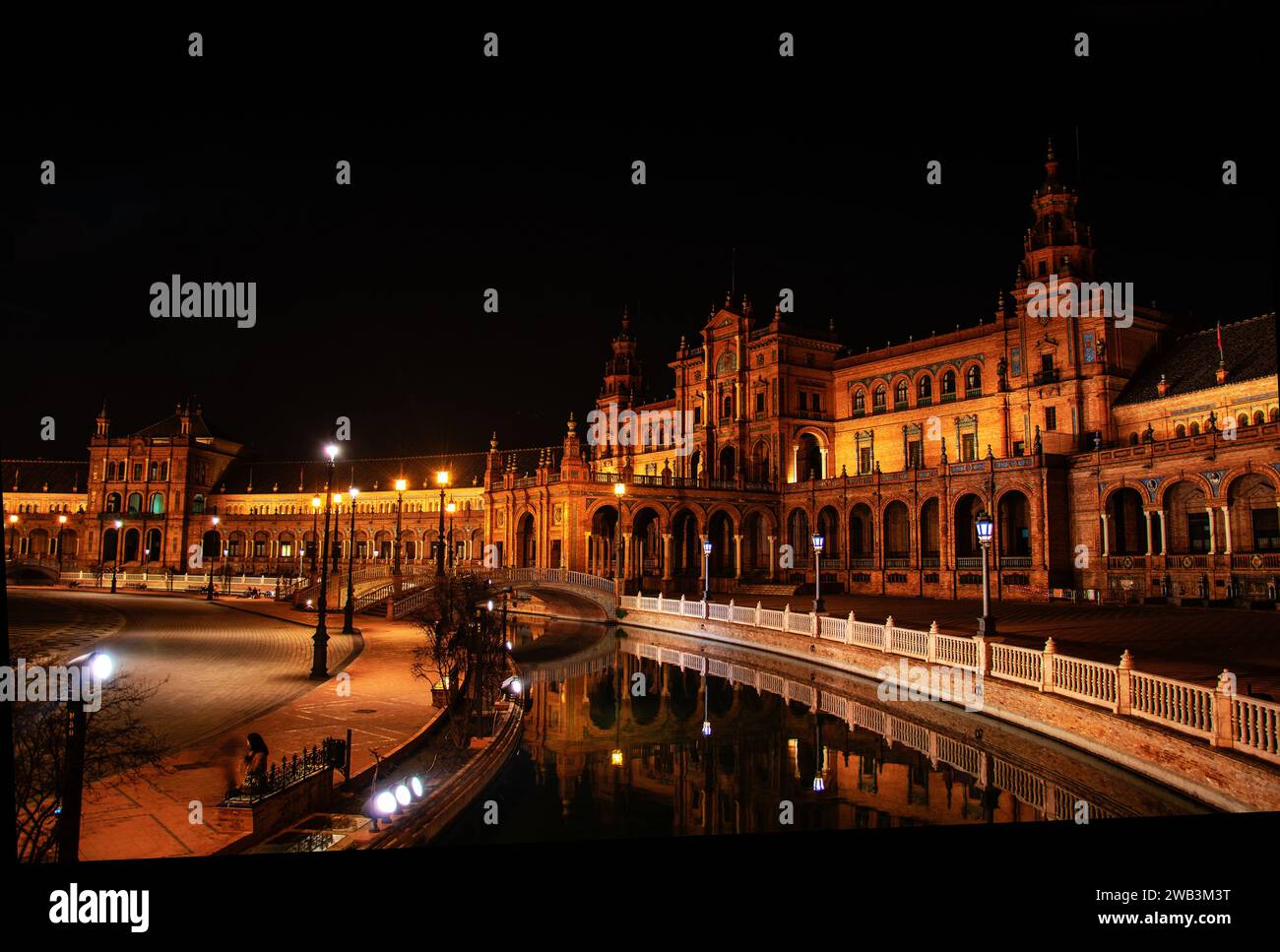 the lights of the night illuminate the beautiful Andalusian city of ...
