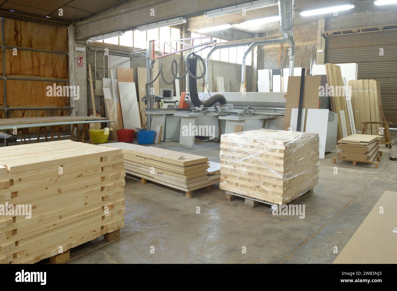 pile of wood stacked in a carpentry shop Stock Photo - Alamy