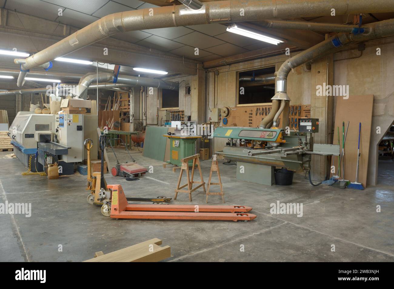 interior view of a carpentry industry with machinery Stock Photo - Alamy