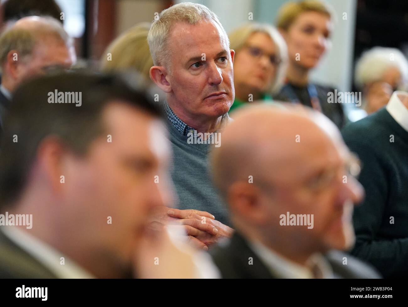 Tech entrepreneur Mark Logan listens to First Minister Humza Yousaf ...