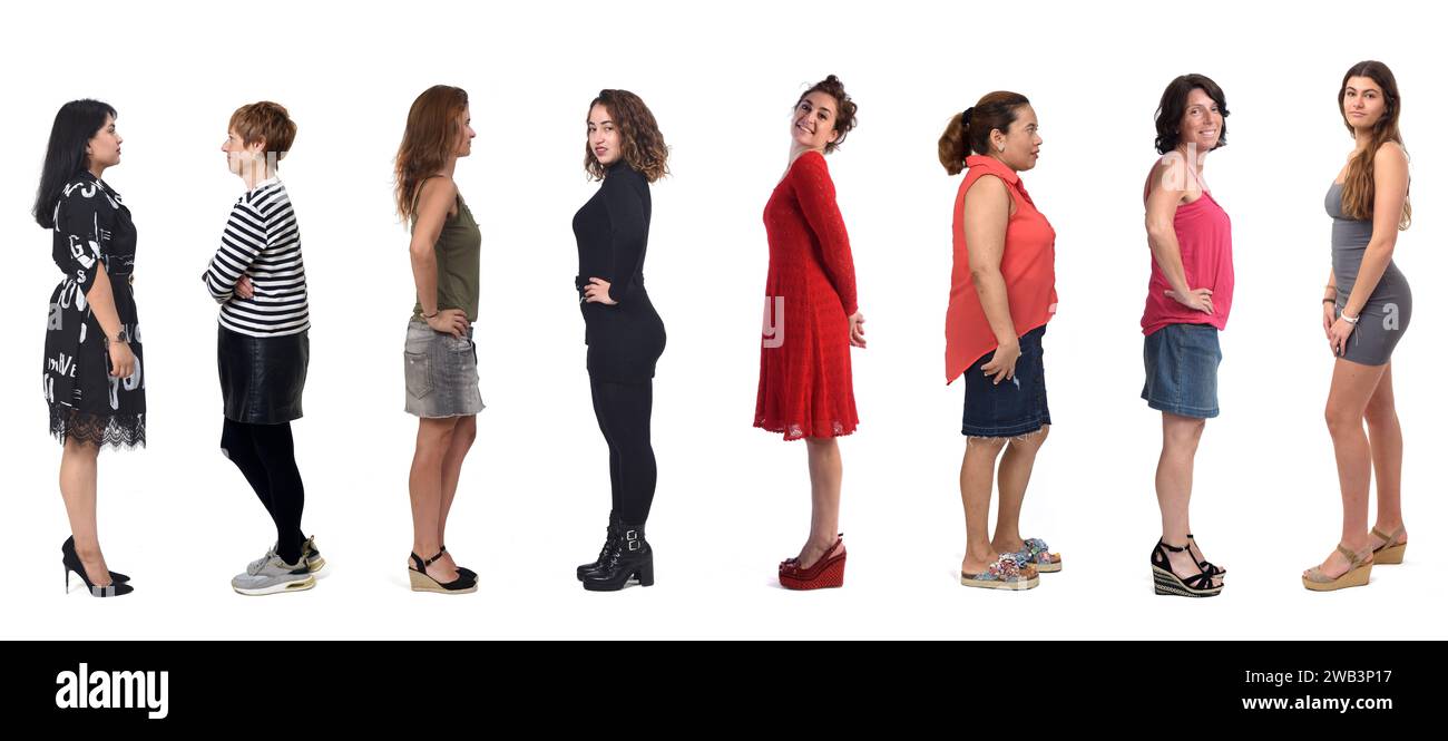 side view of a group of women wearing skirt and dress on white ...