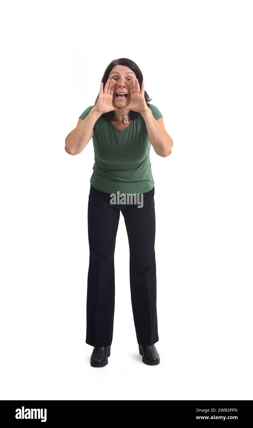 front view of a standing woman who is screaming on white background ...