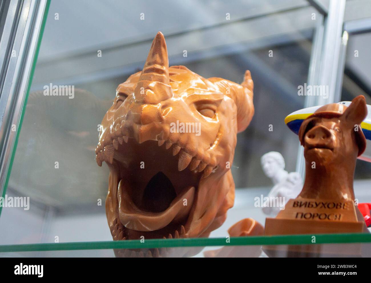 Prototype of art object 3D printed from melted brown plastic. Model of ...