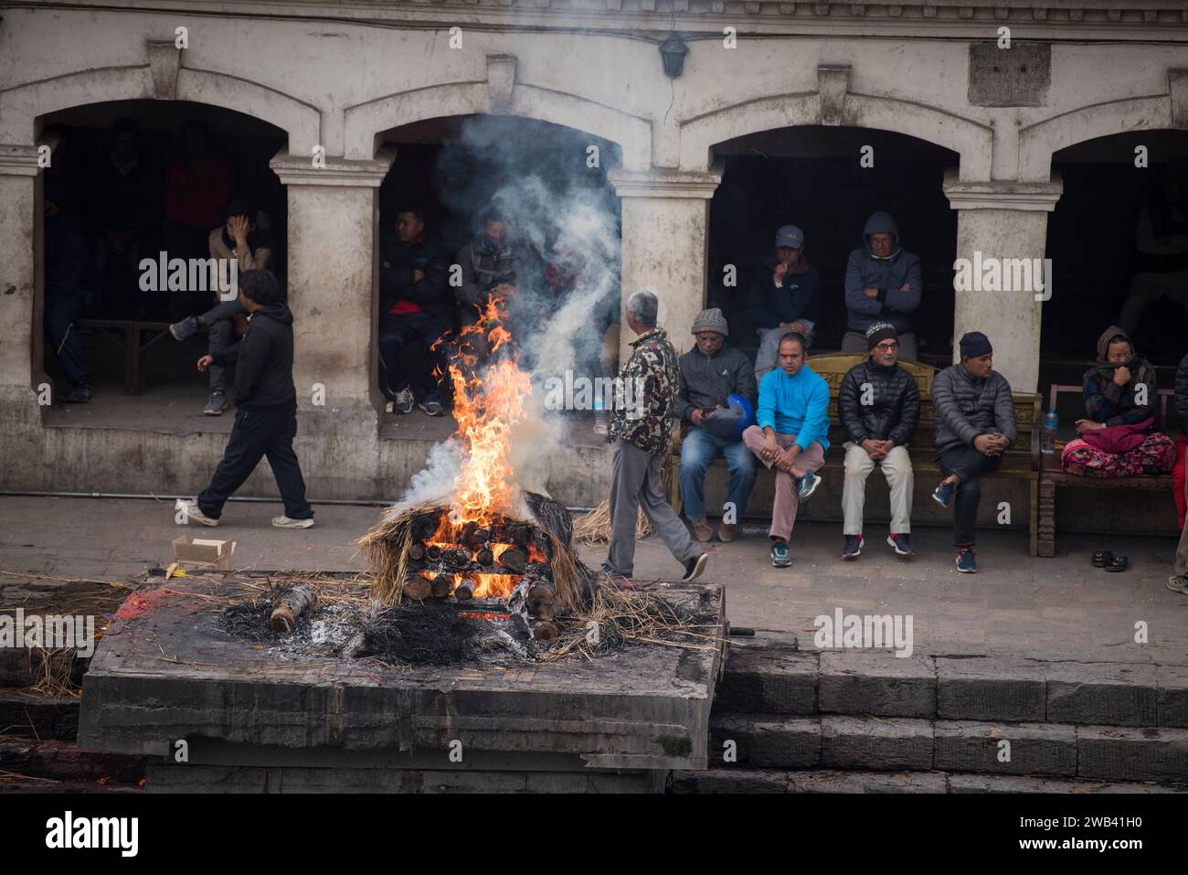 Kathmandu, Nepal- April 20,2019 : Hindu People Cremating dead bodies according to Hindu rituals ...