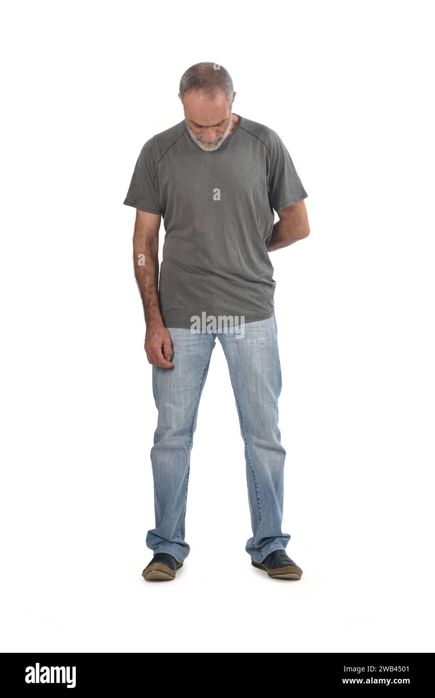 front view of middle aged man looking down on white background Stock ...
