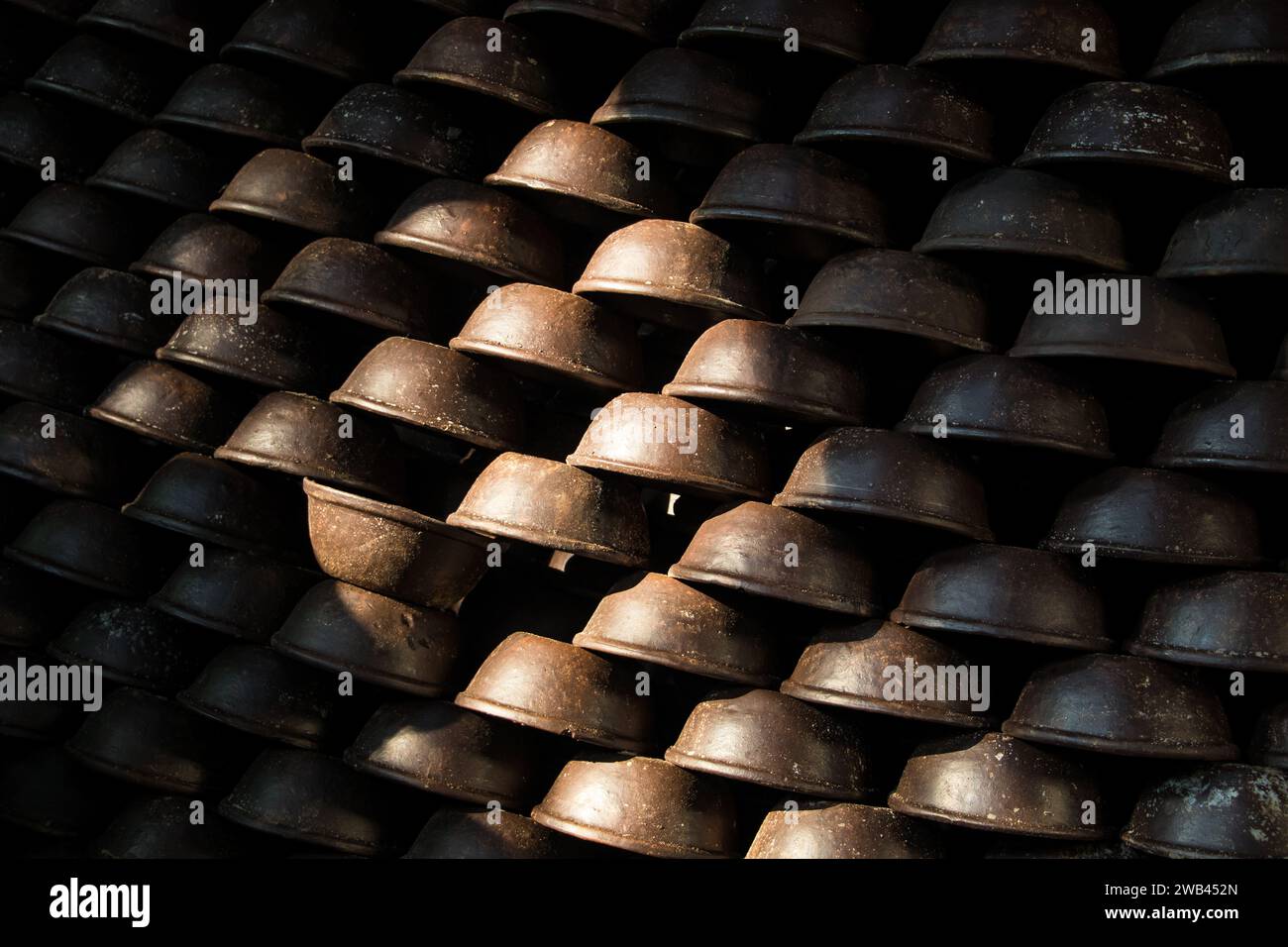 Pottery making involves shaping clay by hand, using a wheel, or coiling ...