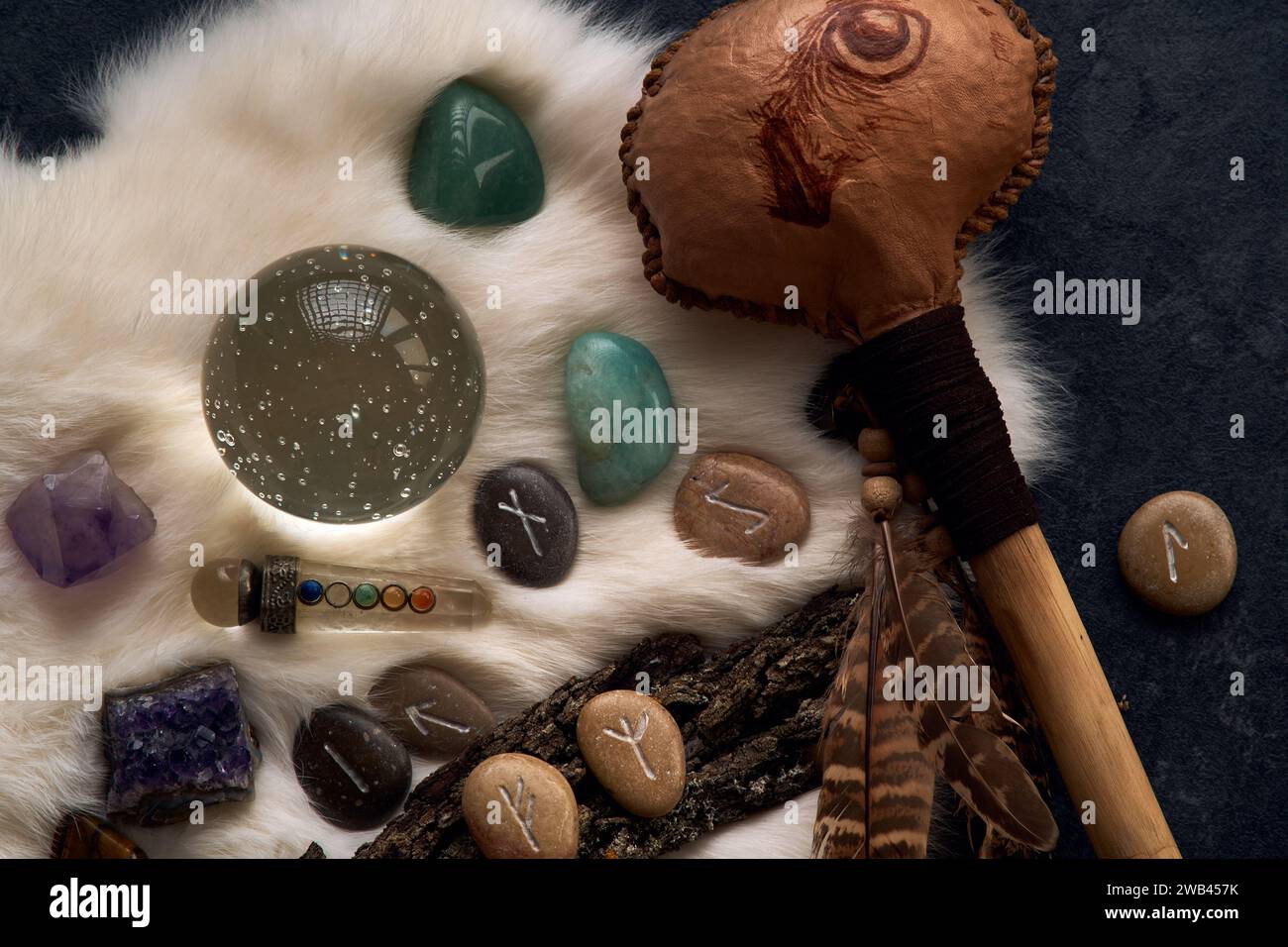 handmade stone runes on white fur Stock Photo - Alamy