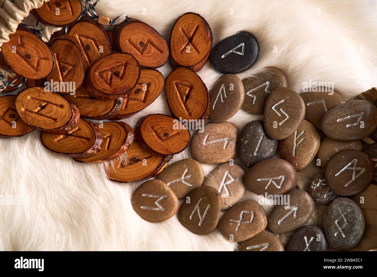 handmade wooden and stone runes Stock Photo - Alamy