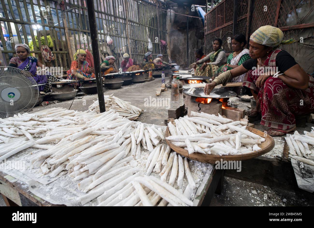 Guwahati, Assam, India. January 8, 2024. Women makes Assamese ...