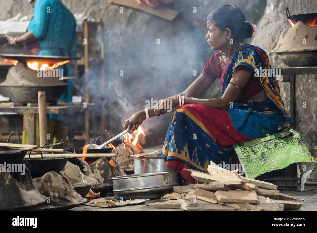 Guwahati, Assam, India. January 8, 2024. Women makes Assamese ...