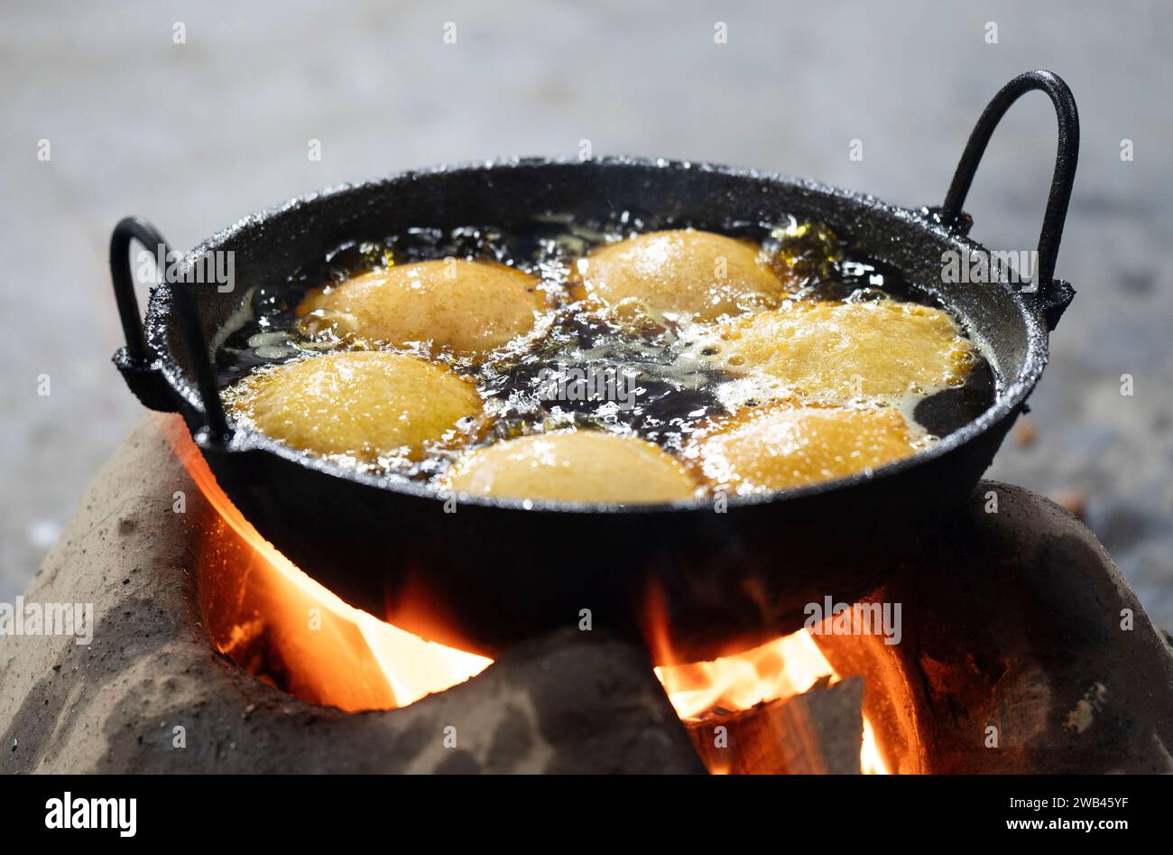 Guwahati, Assam, India. January 8, 2024. Women makes Assamese ...