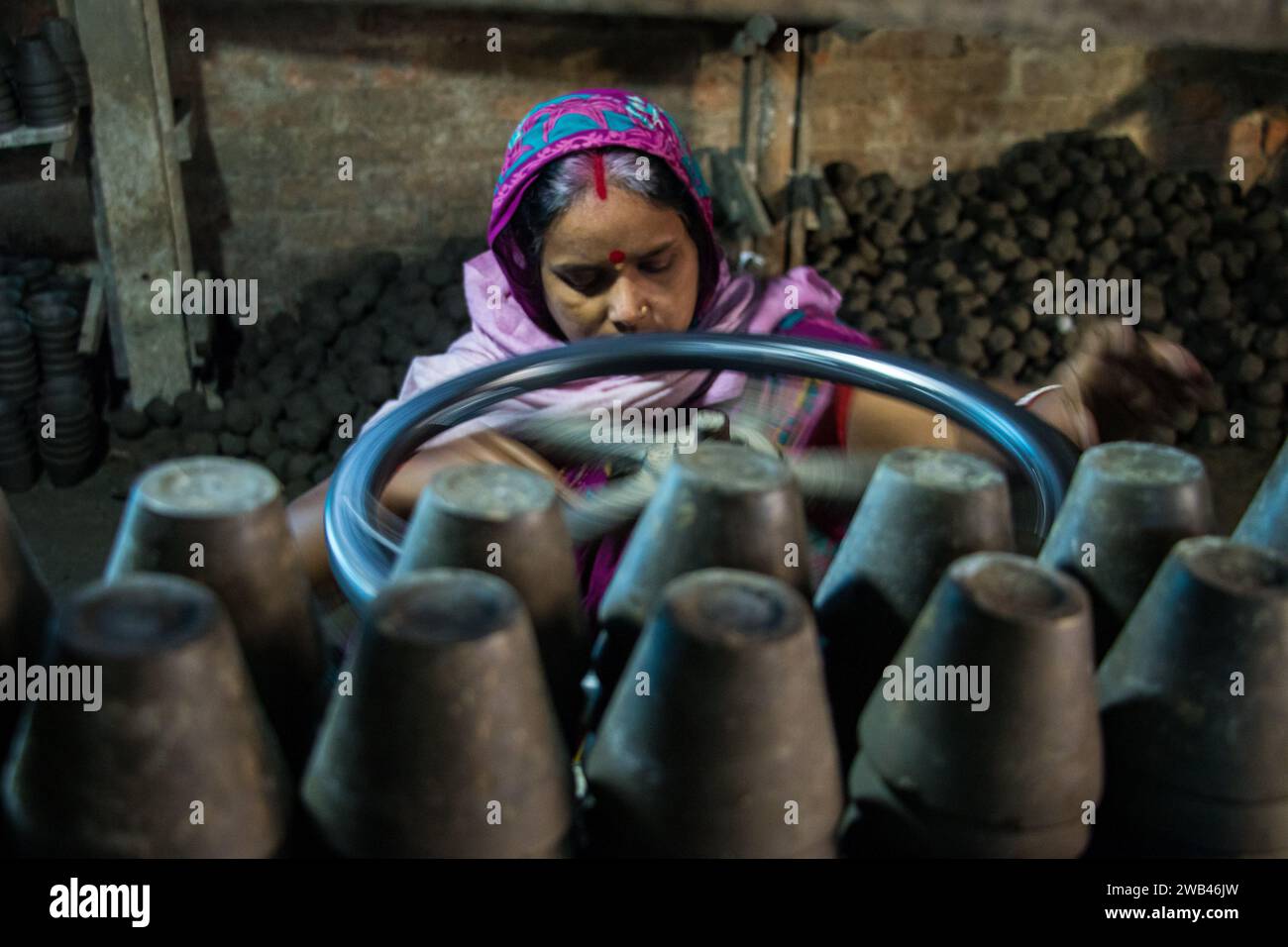 Pottery making involves shaping clay by hand, using a wheel, or coiling ...