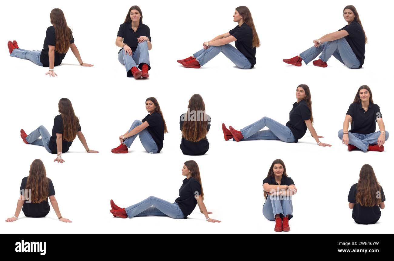 large group of same young girl sitting on the floor on white background ...
