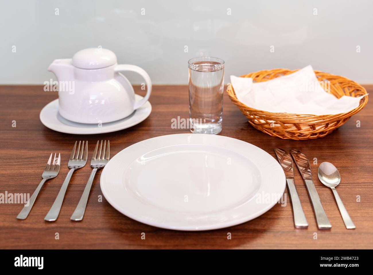 Bavaria, Germany - January 6, 2024: Set table with plates and cutlery ...