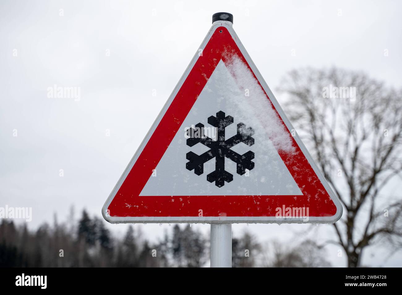 Diedorf, Bavaria, Germany - January 8, 2024: Warning sign for snow and ...