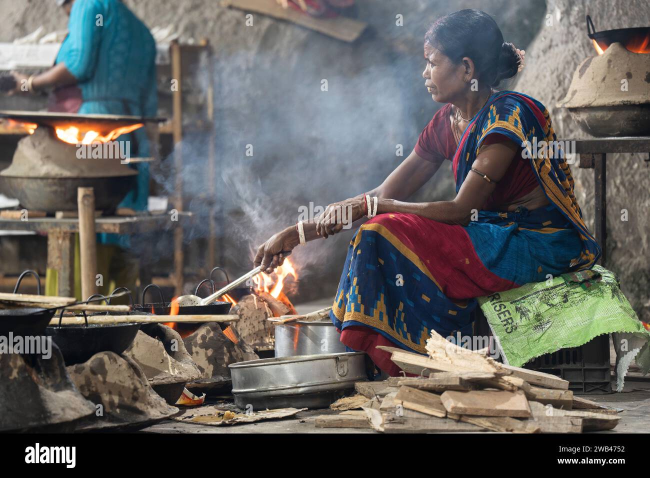 January 8, 2024: Women makes Assamese traditional Tel Pitha or Ghila ...