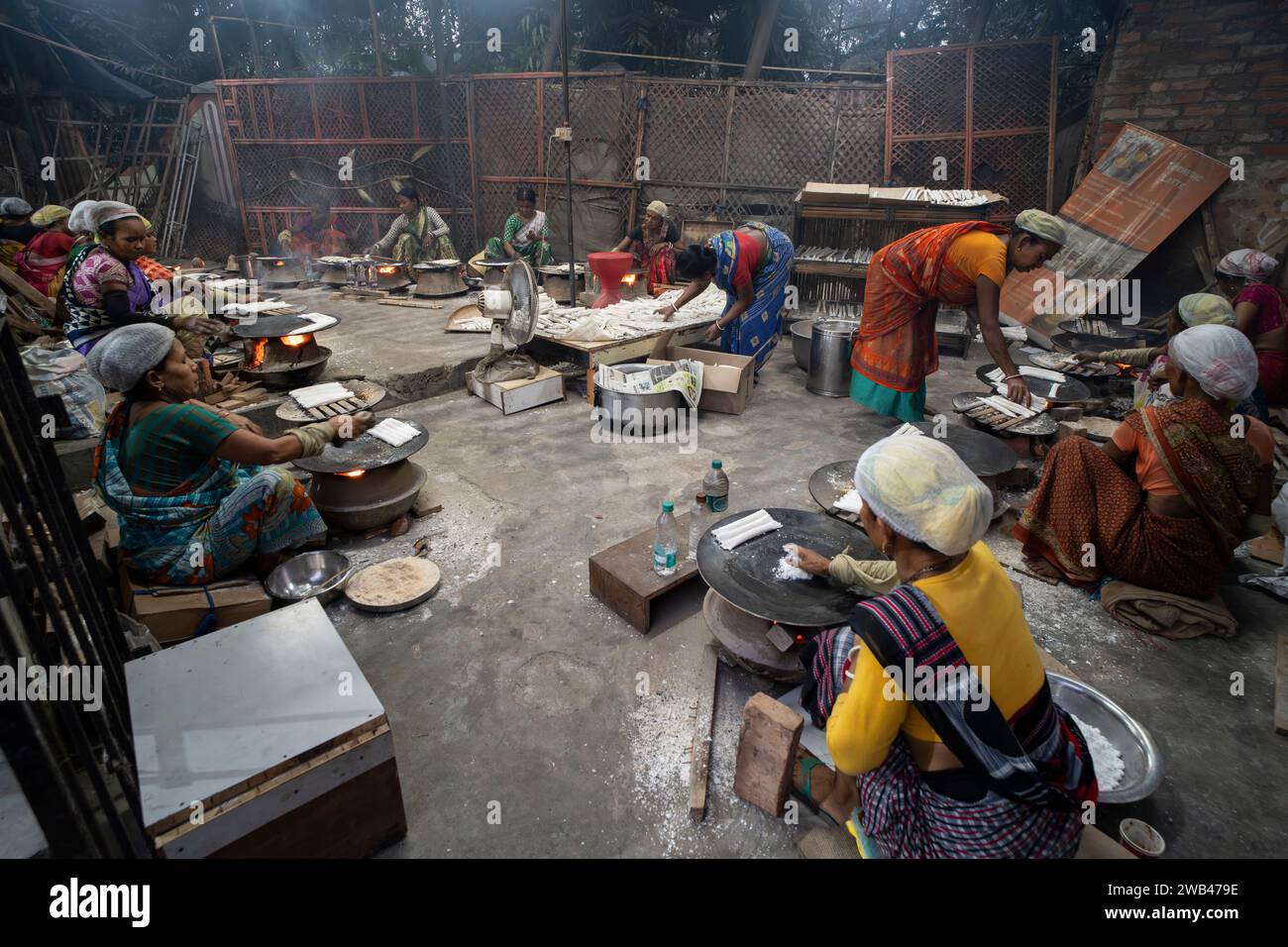 January 8, 2024: Women makes Assamese traditional pitha (Rice cake ...