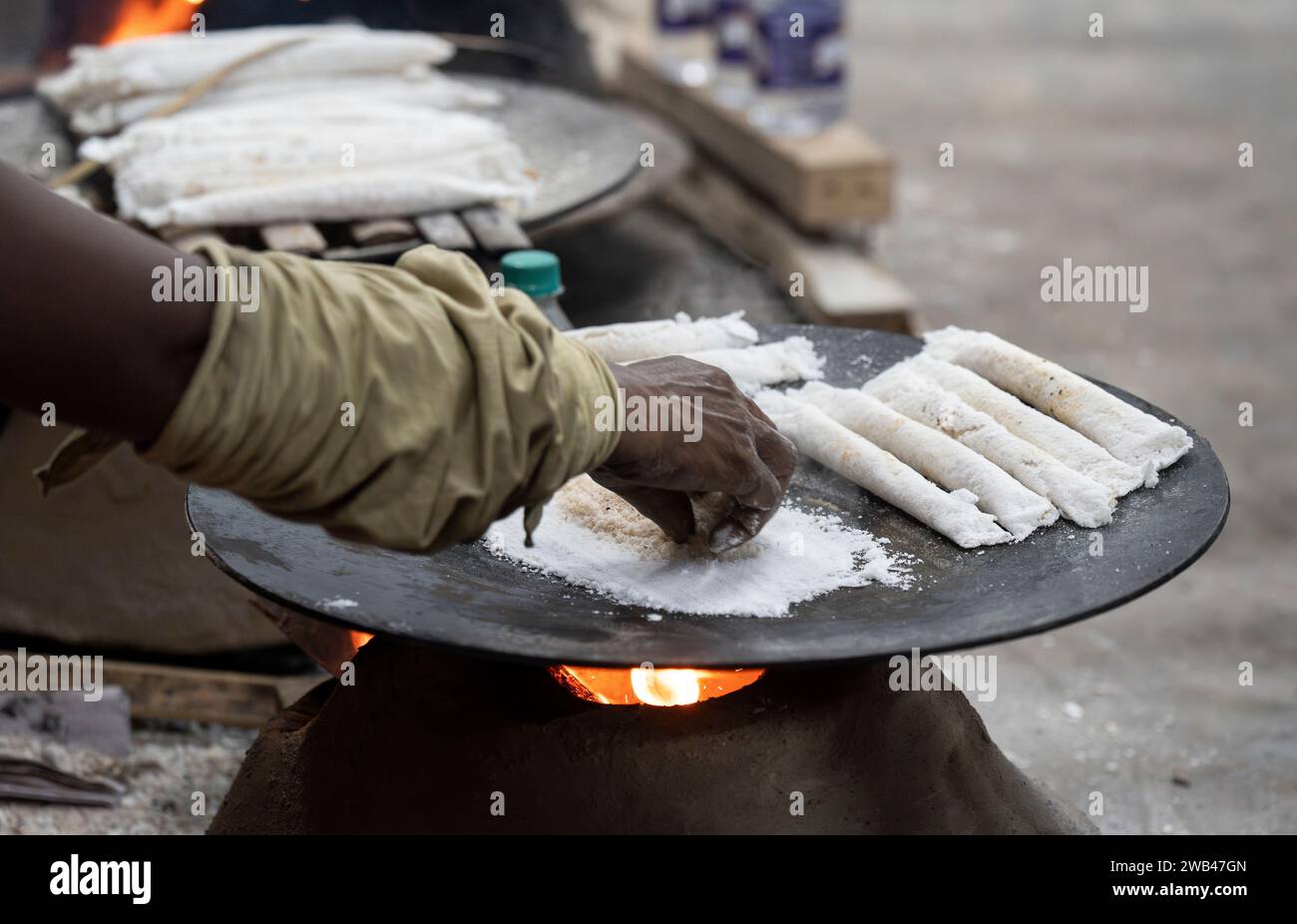 January 8, 2024: Women makes Assamese traditional pitha (Rice cake ...