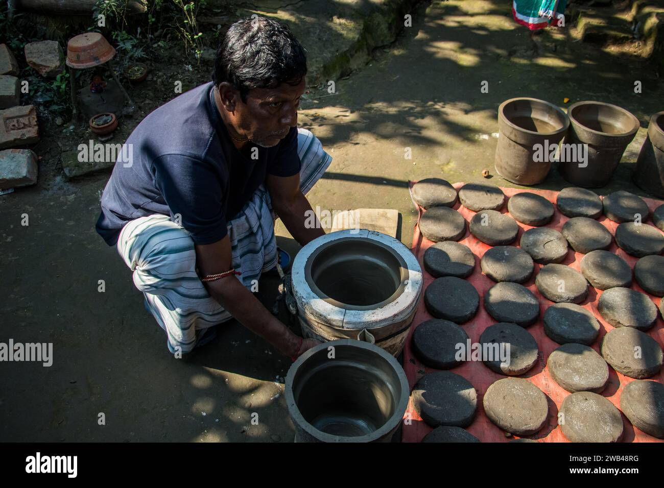 Pottery making involves shaping clay by hand, using a wheel, or coiling ...