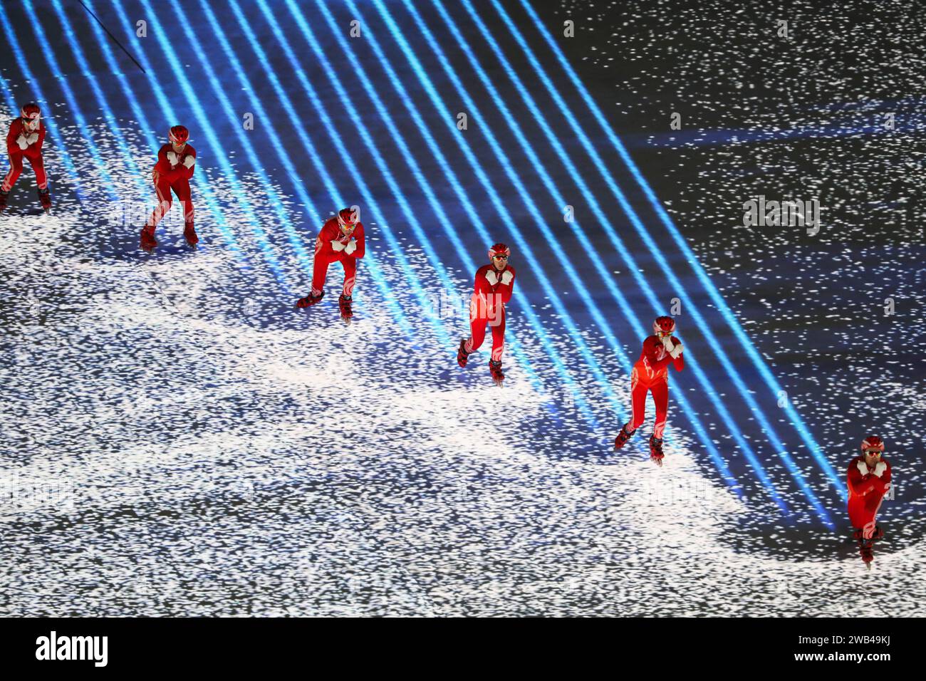 FEB 4, 2022 - Beijing, China: a group of ice skaters carve out paths on ...