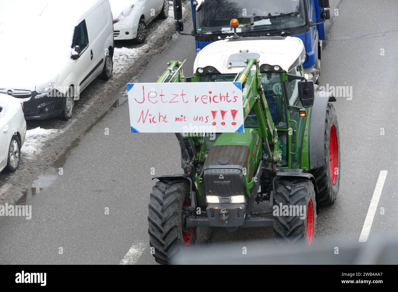 Farmers' protest in whole Germany. 5.500 tractors crossing Munichs main ...