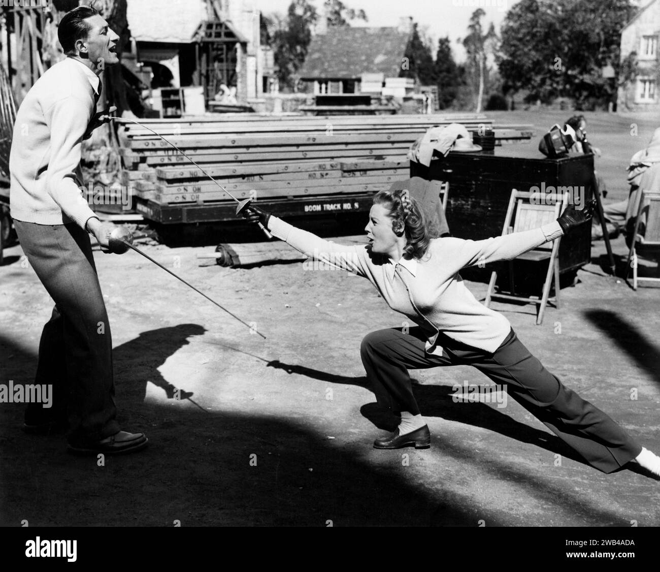 June Allyson taking fencing lessons with the Belgian champion Jean ...
