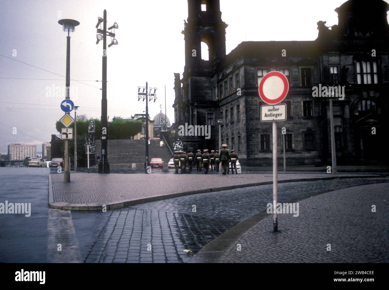 Soviet soldiers passing on the Schlossplatz, at the corner of the ...