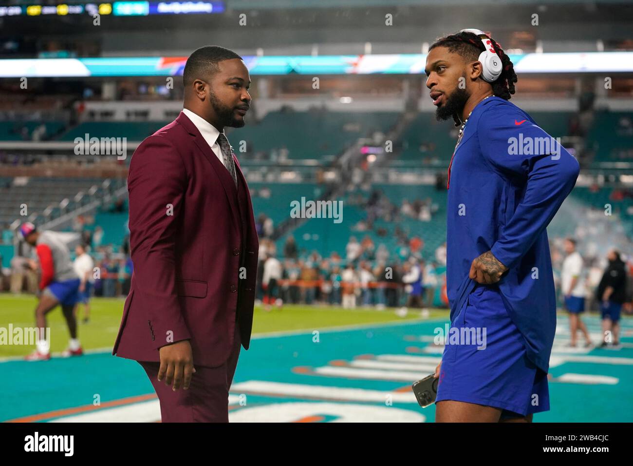 NFL Network reporter Cameron Wolfe, left, talks with Buffalo Bills ...