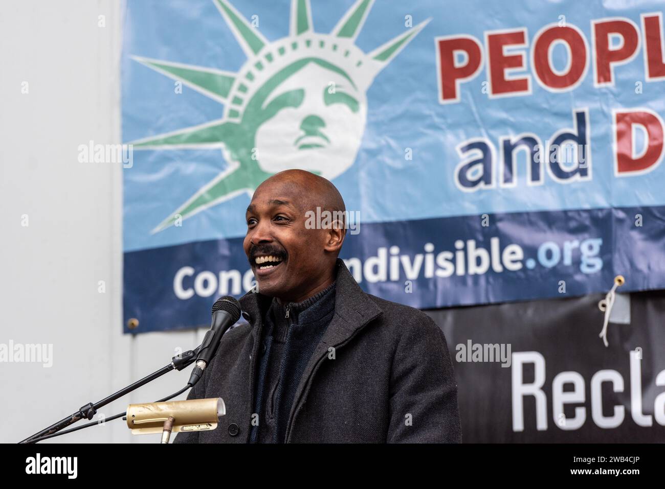 Rob Munro from Concord Academy speaking to a large group of people ...