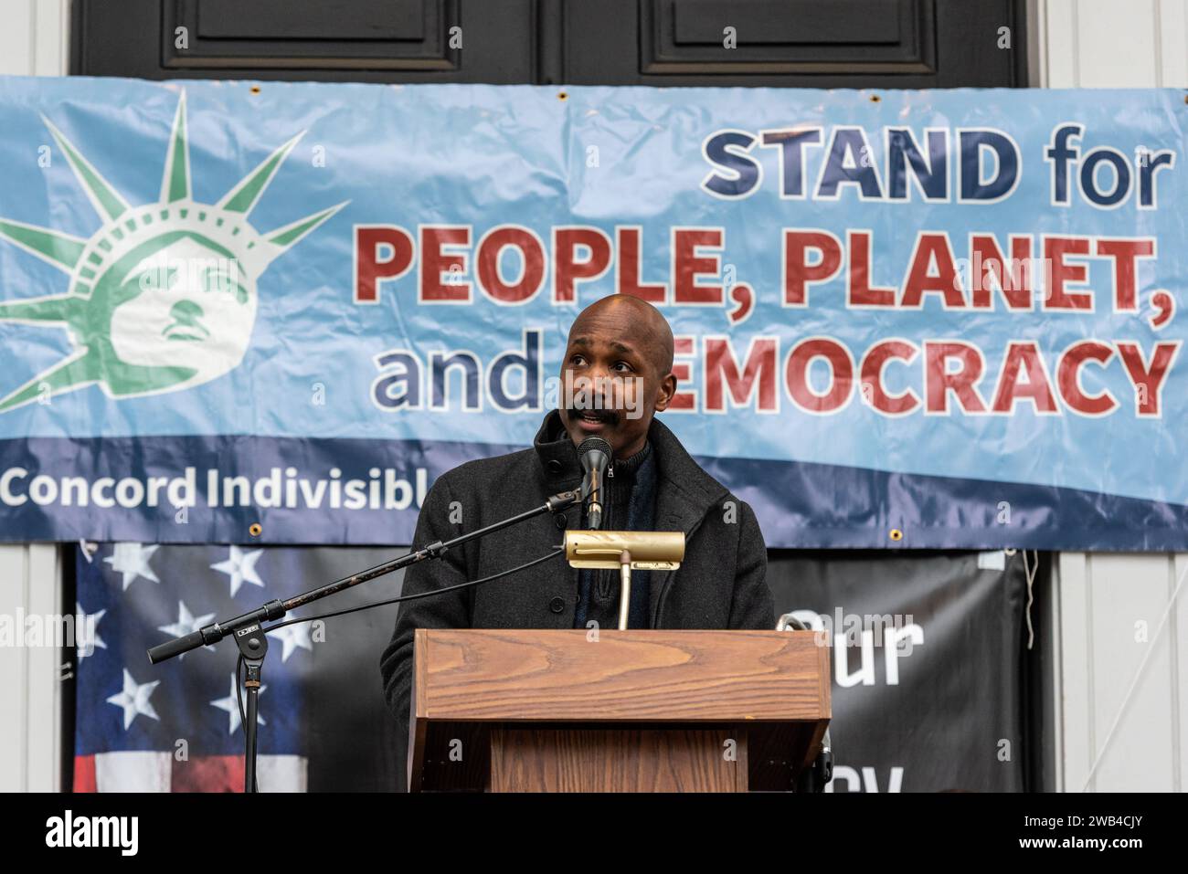 Rob Munro from Concord Academy speaking to a large group of people ...