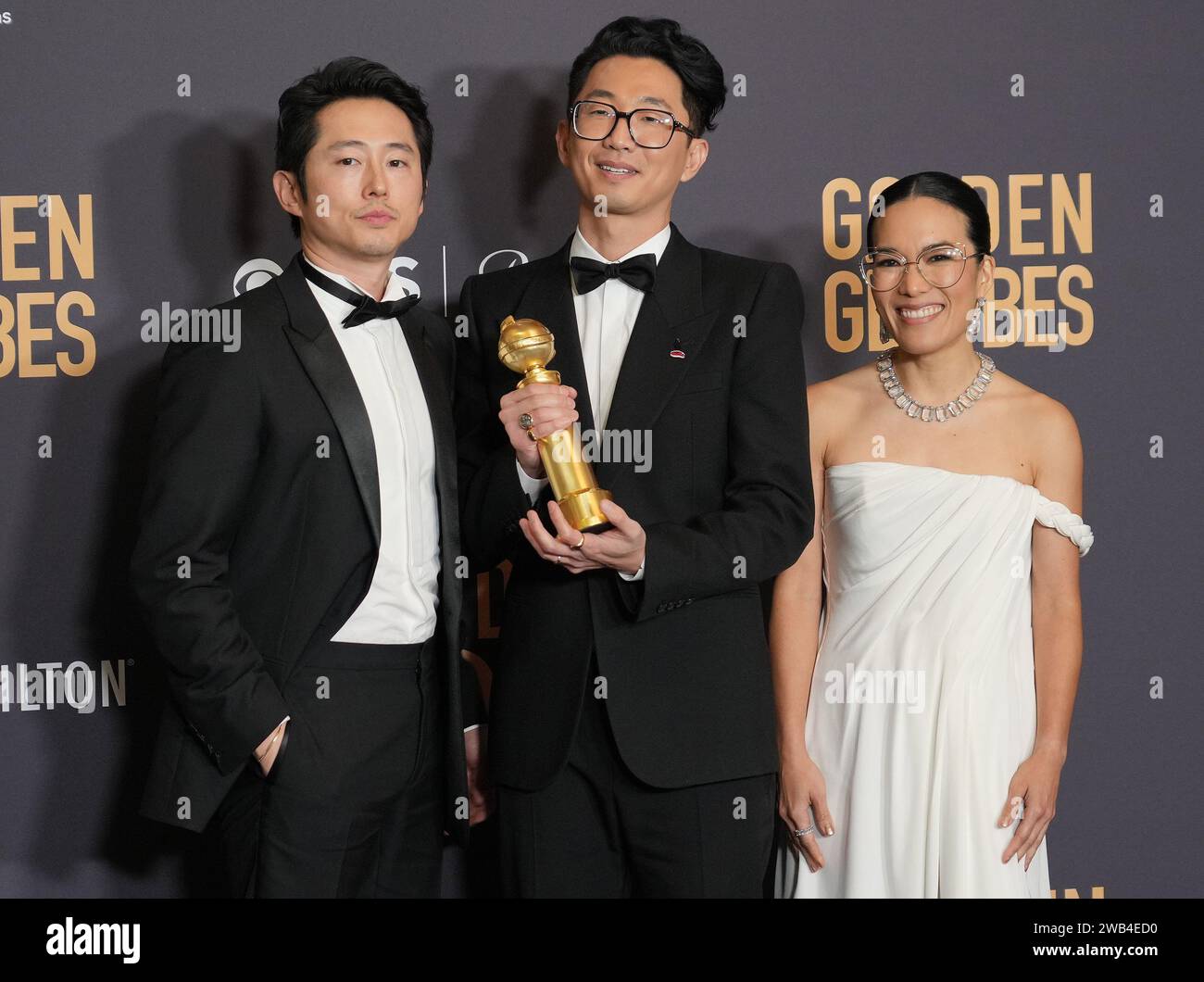 Los Angeles, USA. 07th Jan, 2024. (L-R) Steven Yeun, Writer/Director Lee Sung who won for Best ...