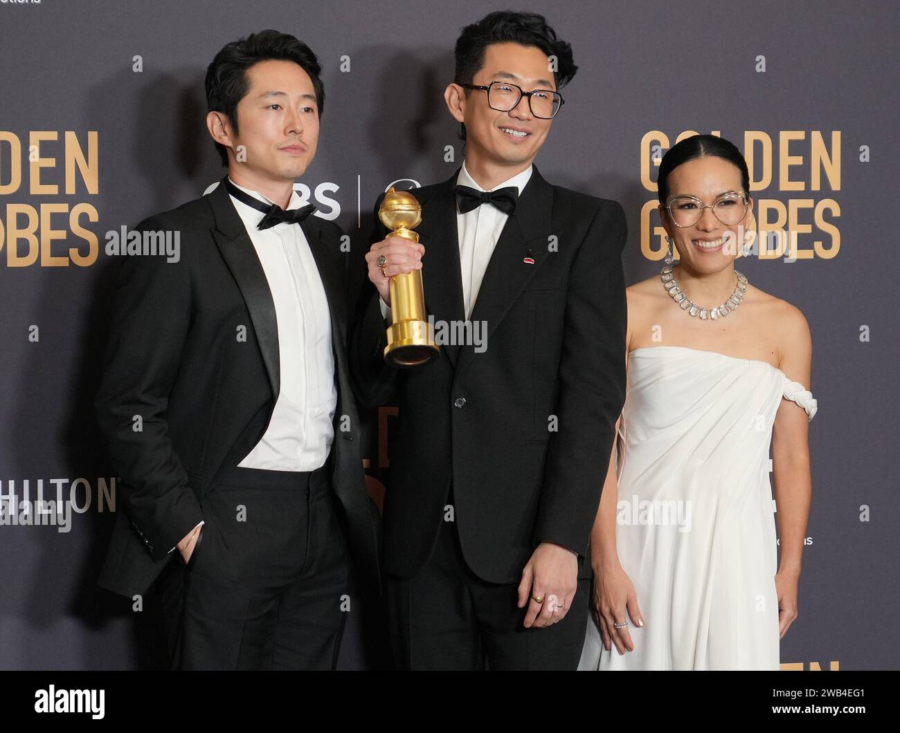 Los Angeles, USA. 07th Jan, 2024. (L-R) Steven Yeun, Writer/Director Lee Sung who won for Best ...