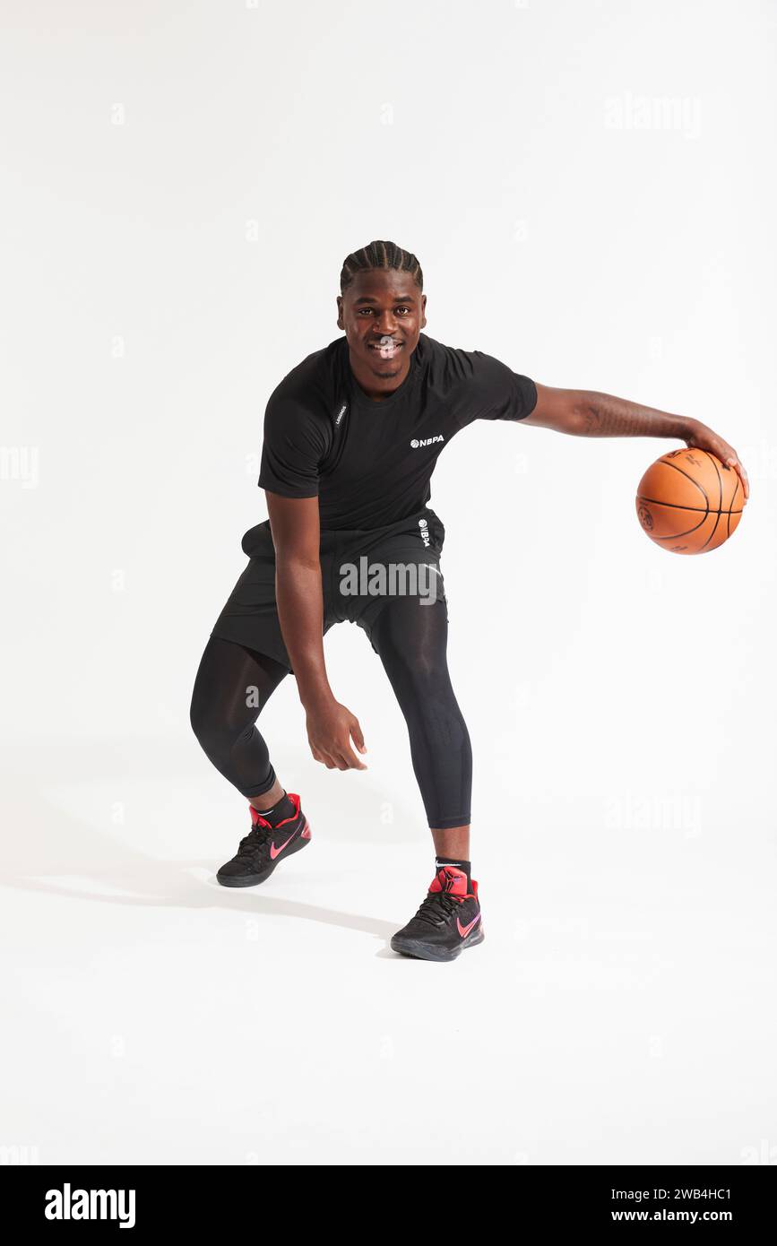 Aaron Holiday poses for a portrait on October 2, 2023 in Houston, Texas ...