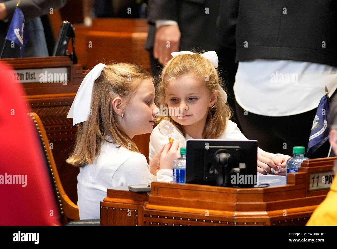 Family members of Republican state senator Patrick McMath sit at his ...