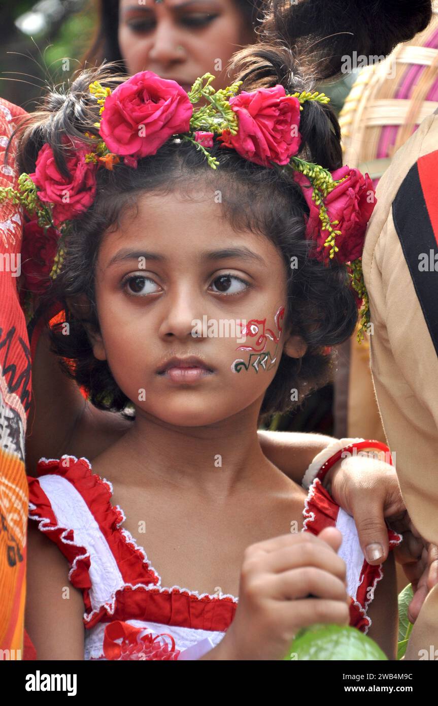 Portrait of a little girl during the New year celebrations. Shahbag ...
