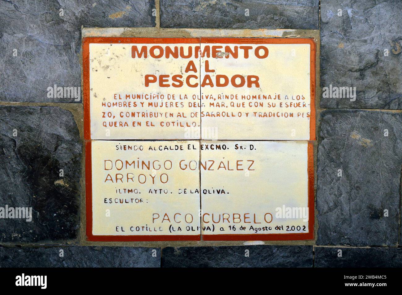 Plaque for the Monumento Al Pescador statue of woman looking out to sea ...