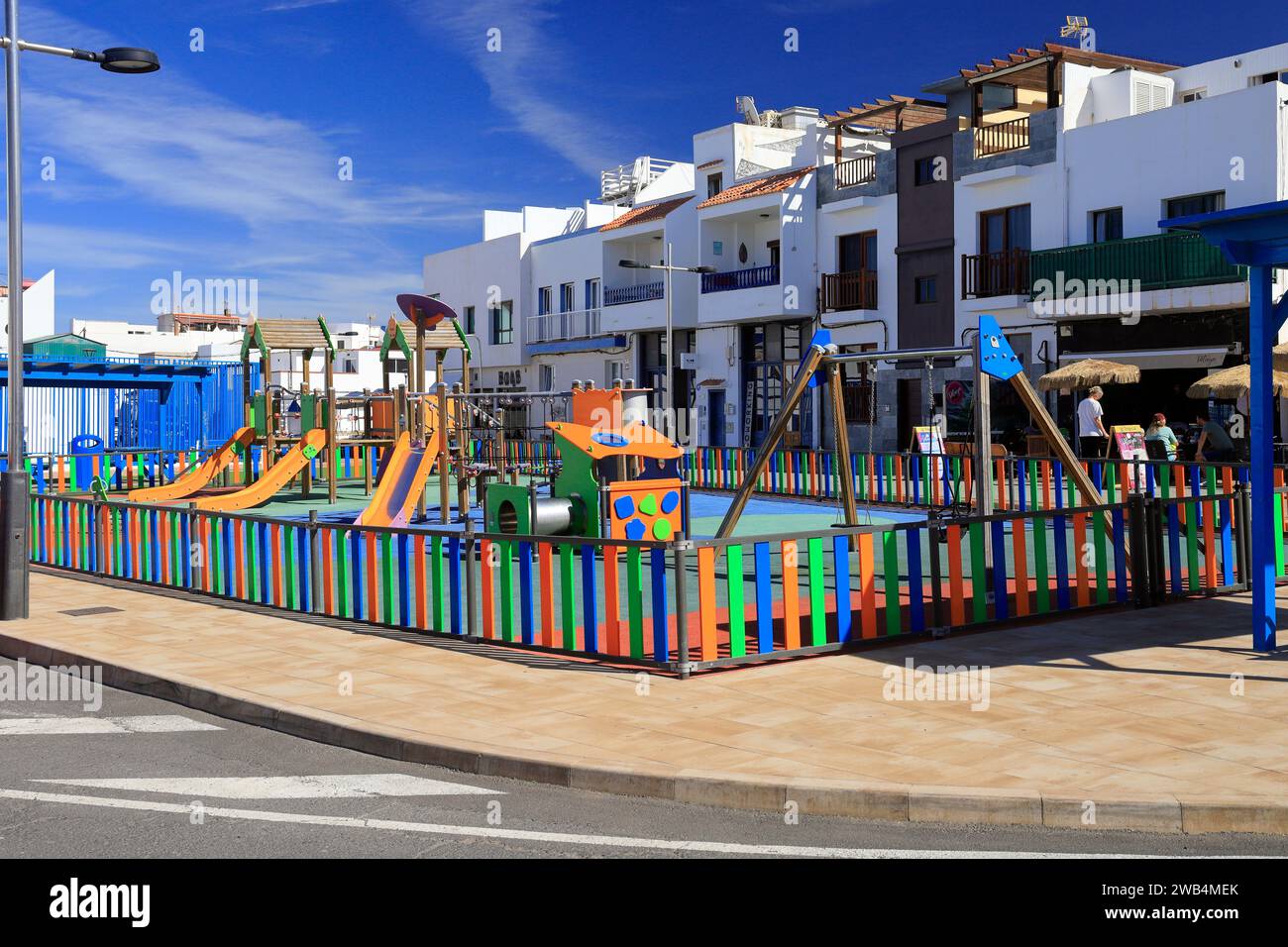 Colourful children's playground, village centre, El Cotillo ...